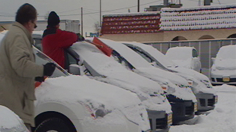 Snow becomes a pain for car dealerships trying show off the merchandise ...