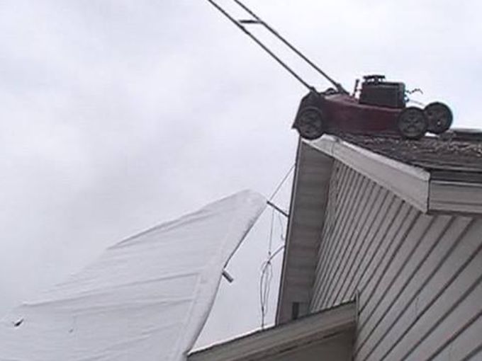 Wind gust tosses mower onto Boise roof | krem.com